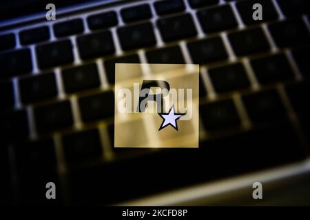 In this photo illustration, the Rockstar games logo is seen displayed ...