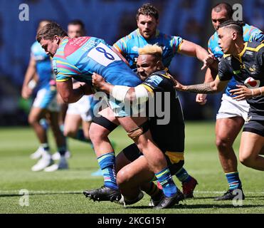 Leicester Tiger's Jasper Wiese is tackled by Newcastle Falcon's Michael ...