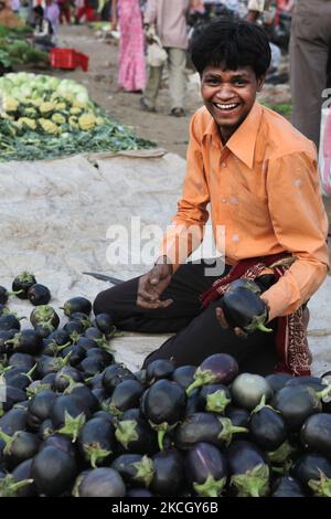 Merchant at the Shaniwaar Subzi Bazaar, which is the largest fruit and ...