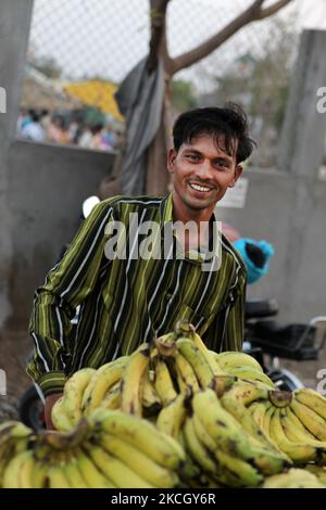 Merchant at the Shaniwaar Subzi Bazaar, which is the largest fruit and ...