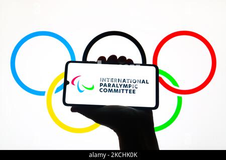 International Paralympic Committee logo is displayed on a mobile phone ...