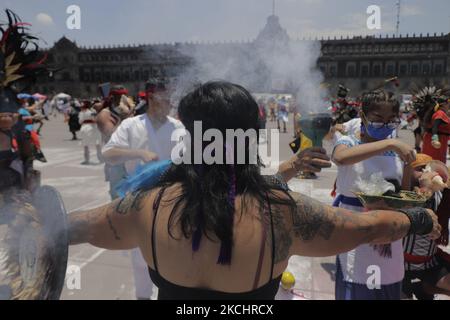 Pre-hispanic ritual with incense, copal and flowers during the 696th ...