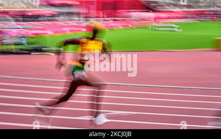 Janieve Russell from Jamiaca during 400 meter hurdles for women at the ...