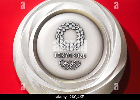 A detailed view of the Tokyo Olympics rings tattoo on the right wrist ...