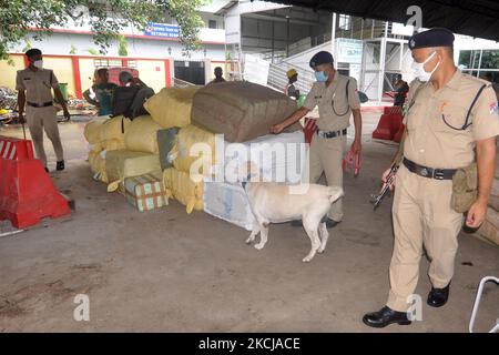 Railway Police Force (RPF) personnel inspect the tracks along with a ...