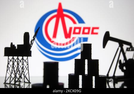 In this photo illustration a CNOOC logo seen displayed on a smartphone ...