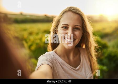 Photo of young woman happy positive smile point finger have idea genius ...