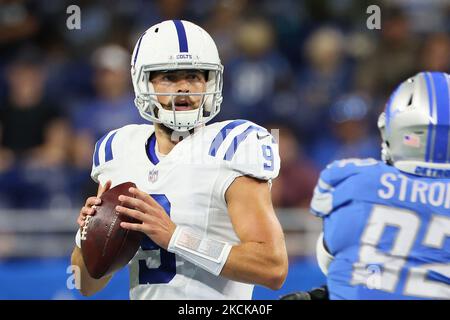 Indianapolis Colts quarterback Jacob Eason (9) breaks a tackle by ...