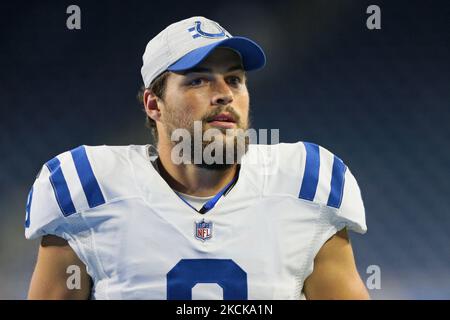 Indianapolis Colts quarterback Jacob Eason (9) breaks a tackle by ...