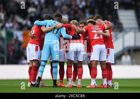 Forest players in a huddle during the Emirates FA Cup Third Round match ...