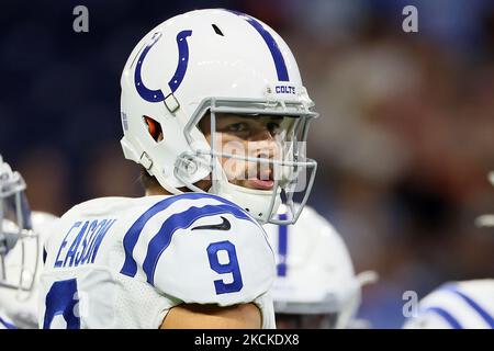 Indianapolis Colts quarterback Jacob Eason (9) breaks a tackle by ...