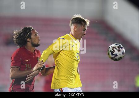 Luca Andronache and Tomas Esteves in action during the friendly game ...