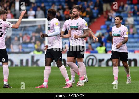 Joe Grayson of Barrow celebrates scoring his side's third goal of the ...