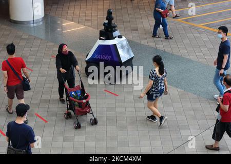 An HTX (Home Team Science and Technology Agency) ground robot, named ...