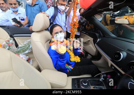 Shooter Avani Lakhera shows her gold and bronze medal that she won at ...