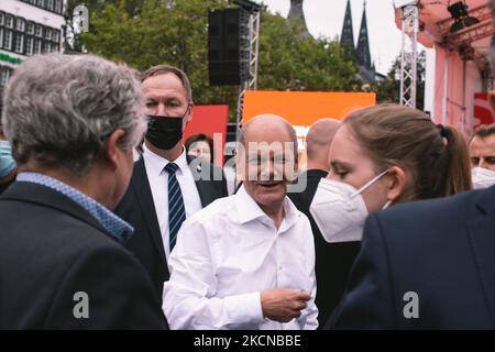 supporters line up for selfie with Social Democratic party candidate ...