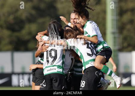 Brenda Perez celebrates her goal with teammates during the match for ...