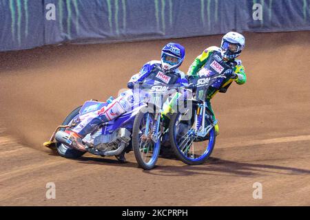 Jason Doyle of Australia (White) locks up behind Dmitri Berge of France ...