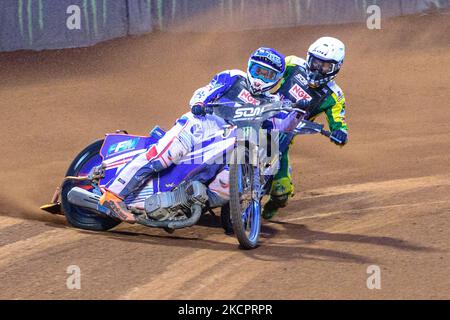 Jason Doyle of Australia (White) locks up behind Dmitri Berge of France ...