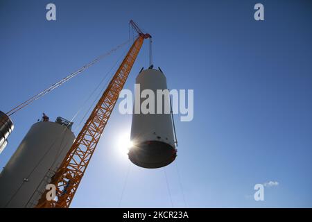 A GSE tank's shell is lowered into place on October 18th, 2021. (Photo ...