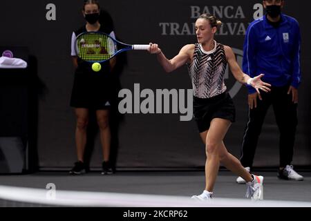 Ana Bogdan in action - receiving the ball during her match against Emma ...