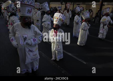A group of chinelas dance during the First Great Parade of Huehuenches ...