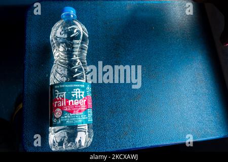 July 4th 2022 Haridwar India. A man holding Rail Neer packaged drinking ...