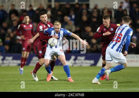 Mark Cullen of Hartlepool United battles with Aaron Morley of Rochdale ...