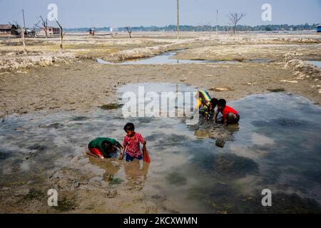People of Cyclone Sidr and Cyclone Aila affected area seen fishing in ...