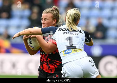 Rachel Chaboter of Canada is tackled by Tara Stanley, Vicky Molyneux ...