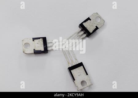 Multiple thyristors isolated on a white background. Thyristor is the ...