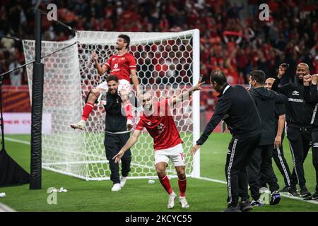 (19) Mohamed Magdi Kafsha of Al Ahly team battles for possession with ...