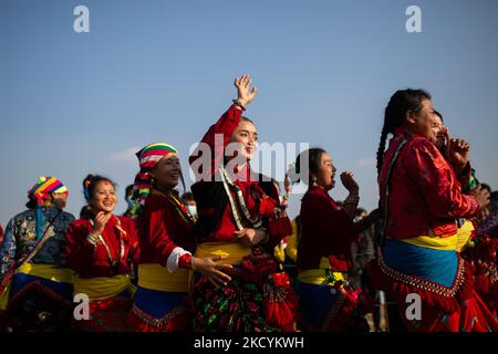 People from the Kirat community wearing traditional attire dance during ...
