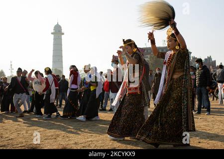 People from the Kirat community wearing traditional attire dance during ...