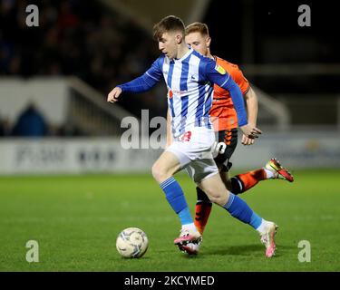 Hartlepool United's Matty Daly in action with Adam Jackson of Lincoln ...