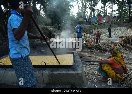 Sugarcane Jaggery in making by boiling sugarcane juice to make ...