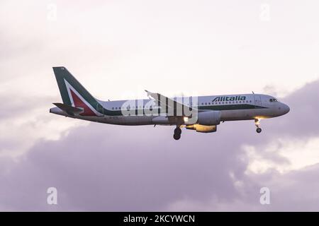 Alitalia Airbus A320 aircraft as seen on final approach flying and ...