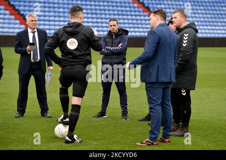 Referee Tom Neild calls off the Sky Bet League 2 match between Oldham ...