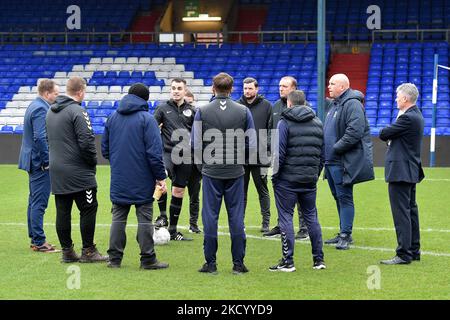 Referee Tom Neild calls off the Sky Bet League 2 match between Oldham ...