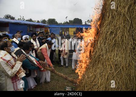 Traditional Assamese 'Meji', a house made of straw, being burnt during ...
