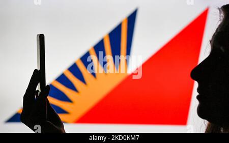 In this photo illustration, the Philippine Airlines logo seen displayed ...