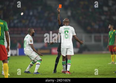 Kassim M'Dahoma of Comoros receiving a red card during Cameroun versus ...