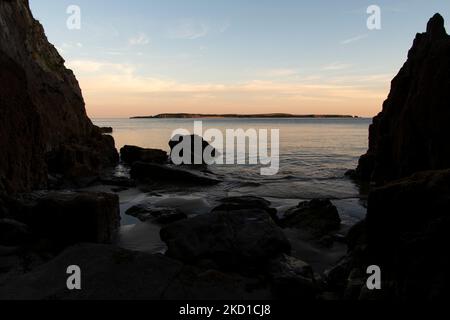 Sunrise view across the Sea to Caldey Island, Tenby West Wales Stock ...