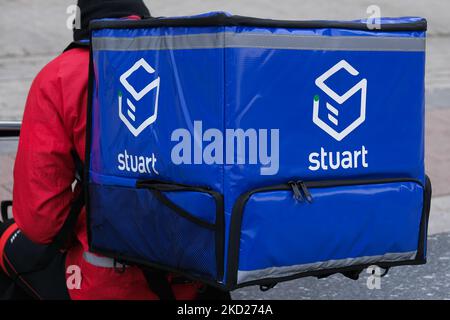 Stuart logo is seen on a courier's bag in Krakow, Poland on February 8 ...