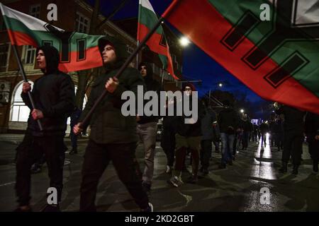 Far-right groups and nationalists carry torches and march to ...
