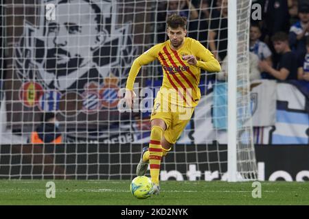 Gerard Pique of Barcelona runs with the ball during the UEFA Champions ...