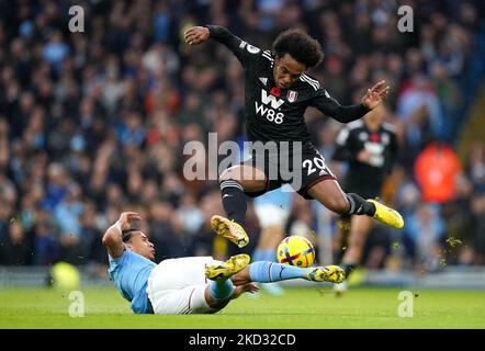 Nathan Aké of Manchester City tackles Eliezer Mayenda of Sunderland ...
