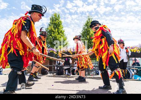 Traditional folk Morris dancers, Ragged Phoenix Morris side, dancing in ...