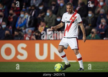 Mario Suarez of Rayo Vallecano in action with Munir El Haddad of ...