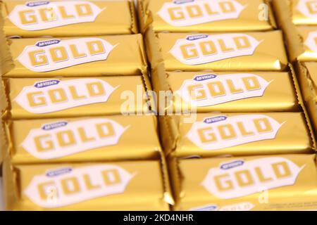 McVities Gold Bars - golden chocolate bar snack treat Stock Photo - Alamy